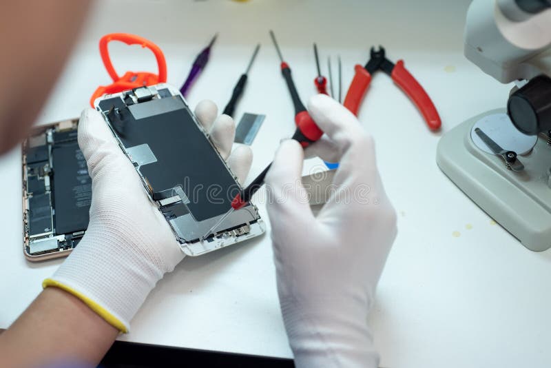 Repair of Smartphones and Laptops in the Service Center Stock Photo ...