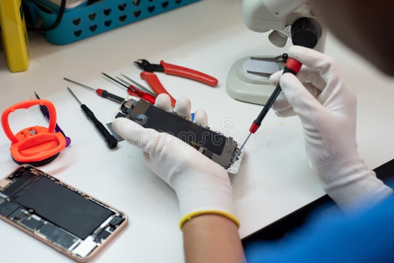Repair of Smartphones and Laptops in the Service Center Stock Photo ...