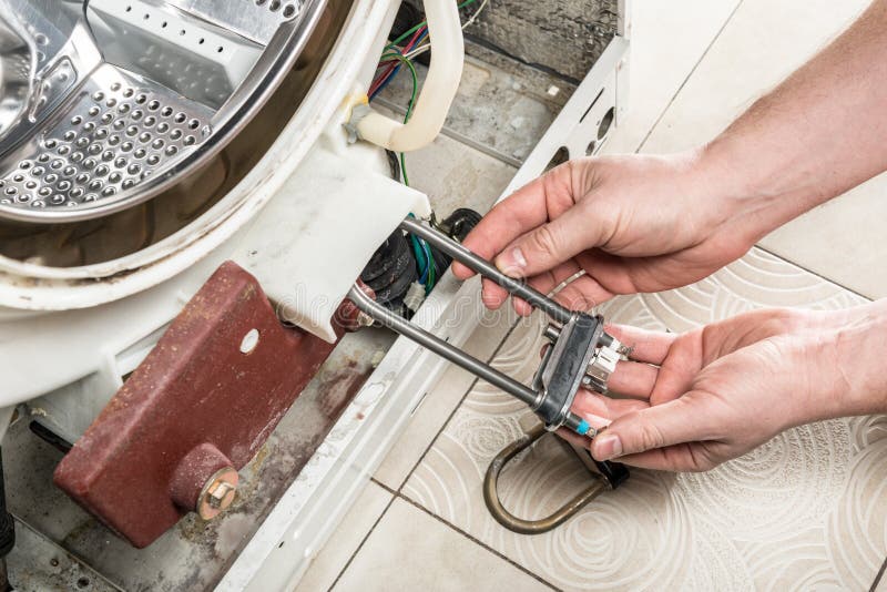 Repair old laundry washer. stock photo. Image of turbular - 98162278