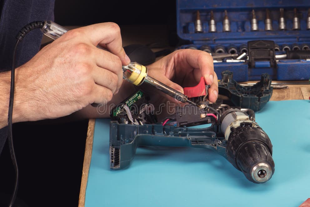 Repair of Power Tools in the Service Center Stock Photo - Image of ...