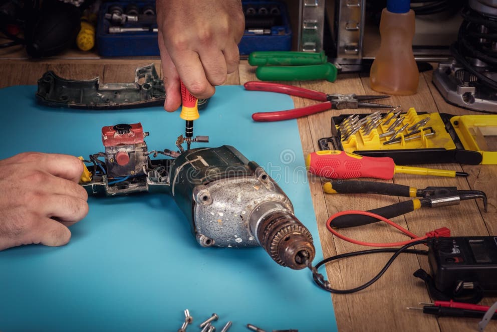 Repair of Power Tools in the Service Center Stock Photo - Image of ...