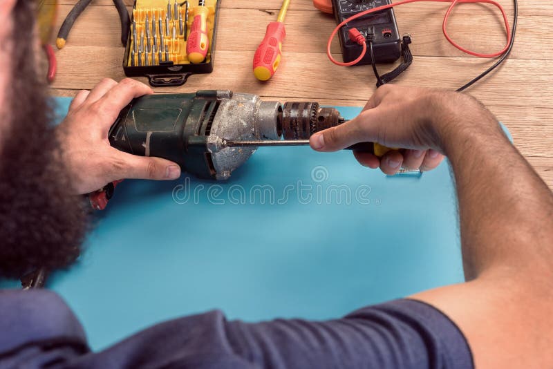 Repair of Power Tools in the Service Center Stock Image - Image of hand ...