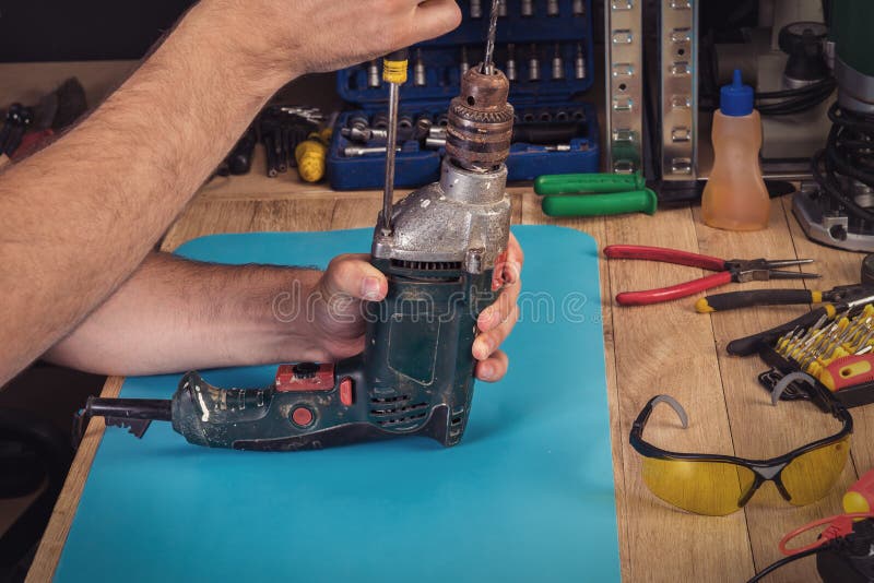 Repair of Power Tools in the Service Center Stock Photo - Image of ...