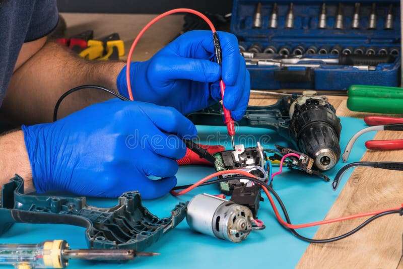 Repair of Power Tools in the Service Center Stock Photo - Image of ...