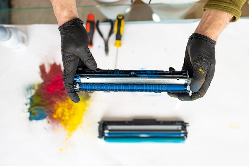 Computer Technician Engineer is Refilling a Laser Toner Cartridge ...