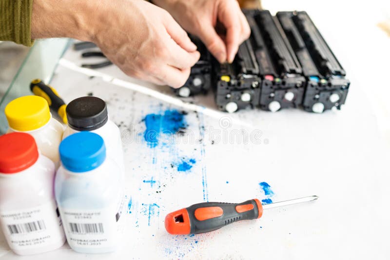 Computer Technician Engineer is Refilling a Laser Toner Cartridge ...