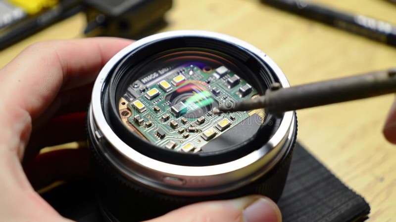Repair Process of Camera Lens at Workshop in the Evening Using ...
