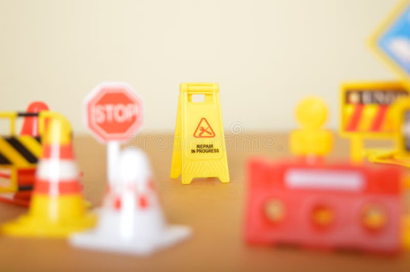 Repair in Progress Warning Sign Symbol with Blurred Background Stock ...