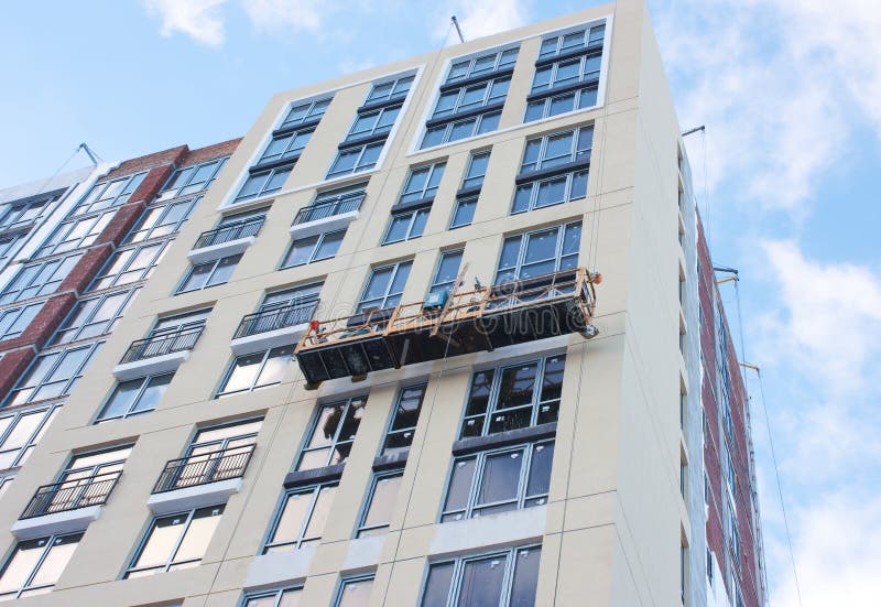 Repair and Restoration of a Facade of a High Building. Stock Photo ...