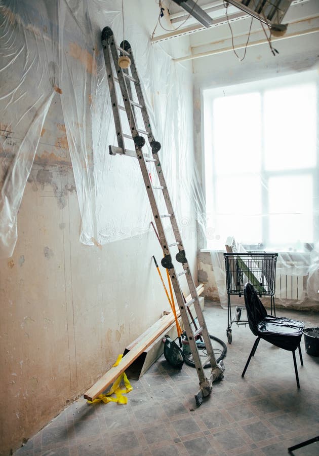 Repair in a Room with a Ladder Against the Wall Stock Photo - Image of ...
