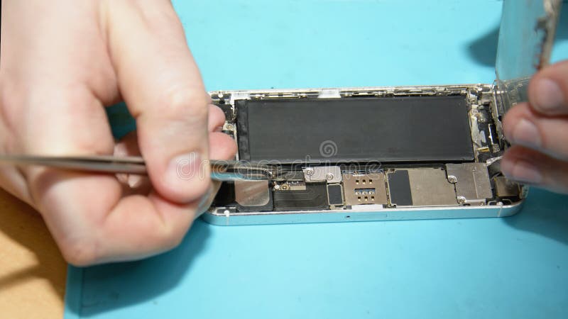 Repair of a Smartphone in a Service Center Stock Photo - Image of ...