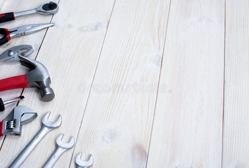 Repair Tools on a White Wooden Background. Jack Keys and Hammer Stock ...