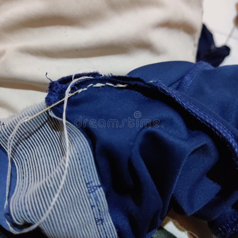 Repair Torn Clothes by Sewing Manually Stock Image - Image of clothes ...