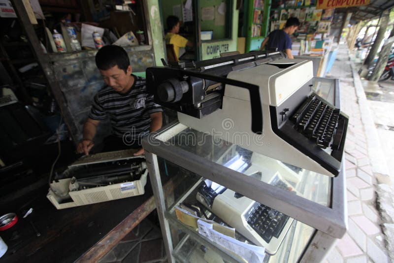 Repair typewriter editorial photo. Image of technician - 38856226