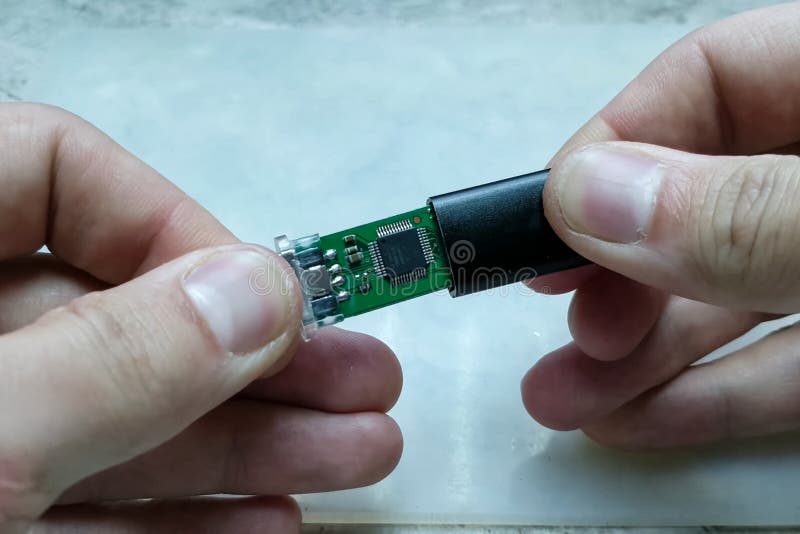 Repair USB Stick. USB Stick USB in Hands of a Master Repairman Stock ...