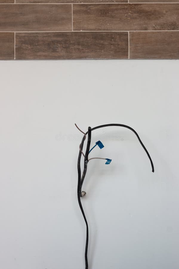 Repair Work. Electrical Wire in the Hole of the Wall Stock Photo ...