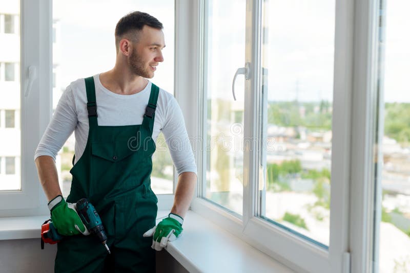 Man is doing window repair stock image. Image of construction - 133446237