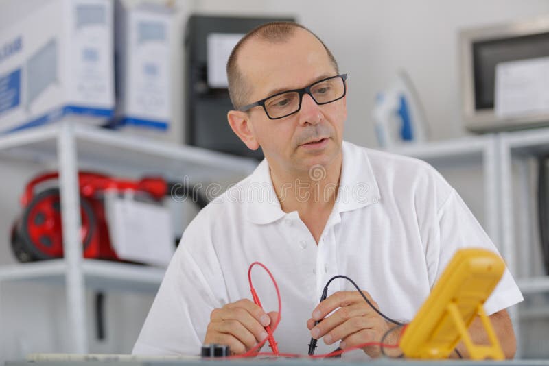 Repairer Using a Multimeter Stock Image - Image of screwdriver ...