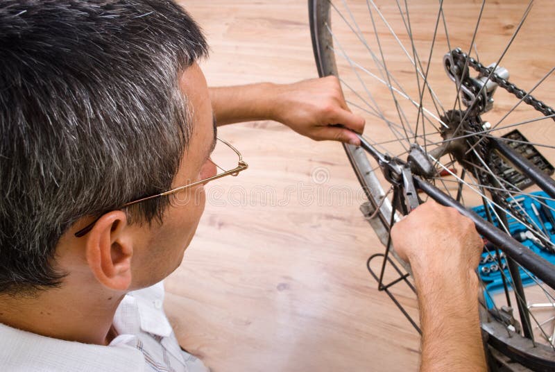 Repairing bike stock image. Image of bike, express, serviceman - 10472279
