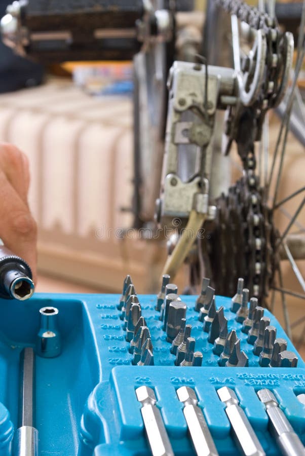 Repairing bike stock photo. Image of cycle, serviceman - 10472308