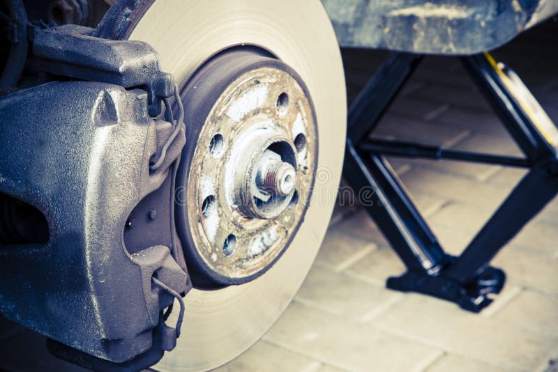 Repairing brakes on car stock photo. Image of garage - 34908014