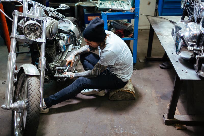 Repairing custom bike stock photo. Image of occupation - 92746984