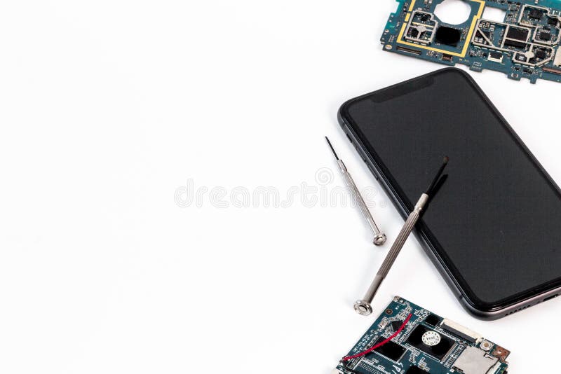 Repairing Electronics Circuit Board - Mobile Phone with Microchips ...
