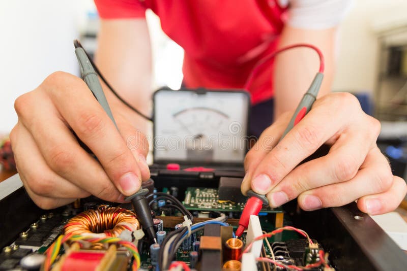 Repairing Electronics with Test Equipment Stock Image - Image of audio ...