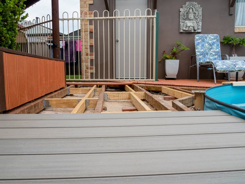 Repairing and Installing New Decking Around a Swimming Pool Stock Image ...