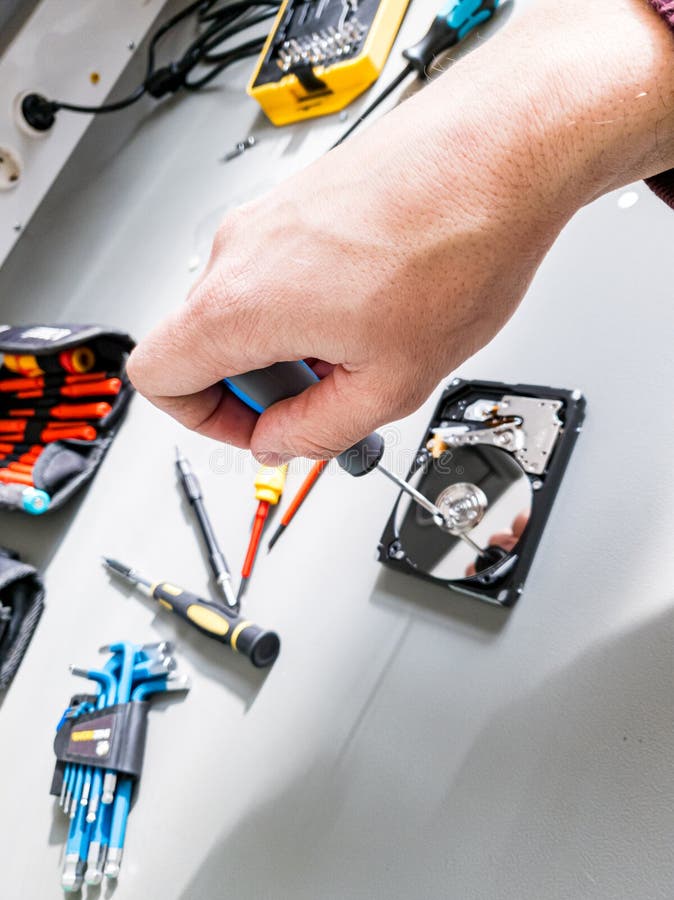 Repairing Malfunctioned Computer Hard Drive - Removing Screws and ...