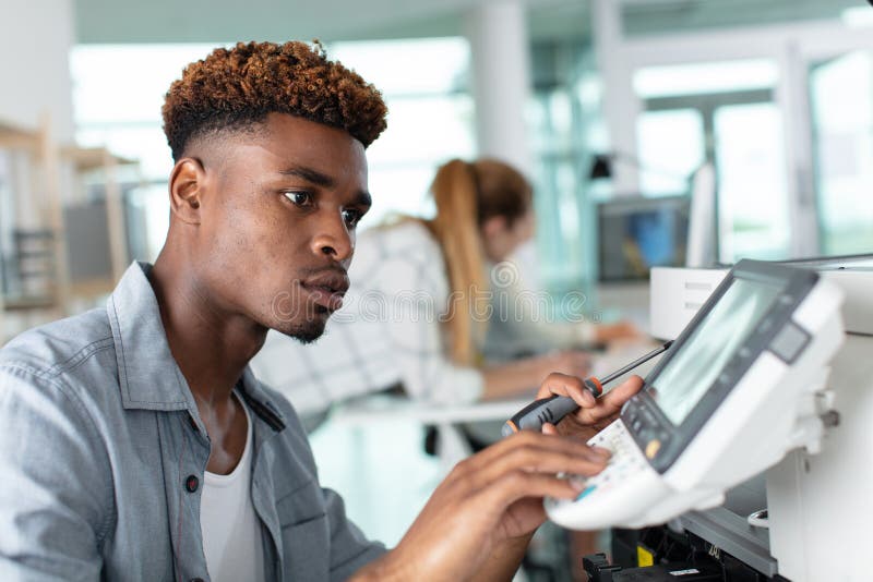 Repairing printer at work stock image. Image of expertise - 265615711