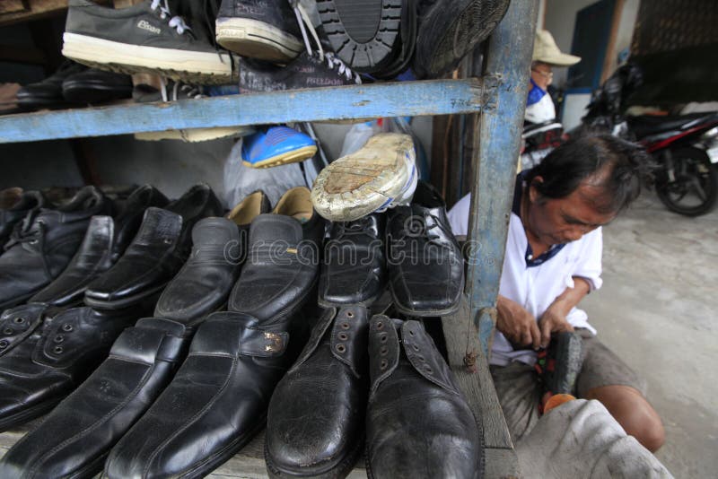 Repairing shoes editorial stock photo. Image of repair - 35882738