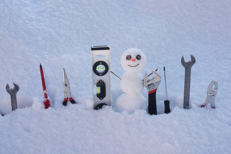 Repairing Tools. Snowman with Repairing Instrument. Snow Man Worker ...