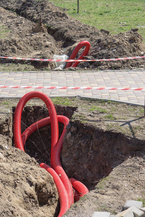 Repairing Underground Communication Pipe in the Park Stock Photo ...