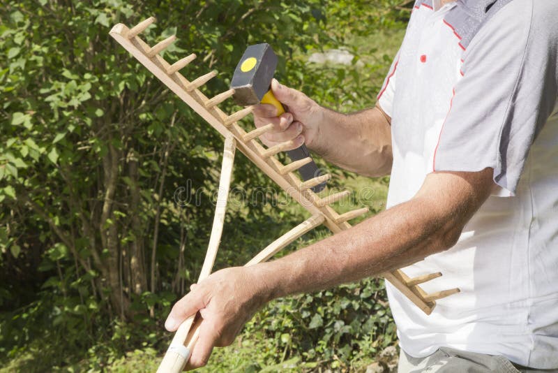 Repairing Wooden Rake- Closeup Stock Photo - Image of caucasian, yard ...