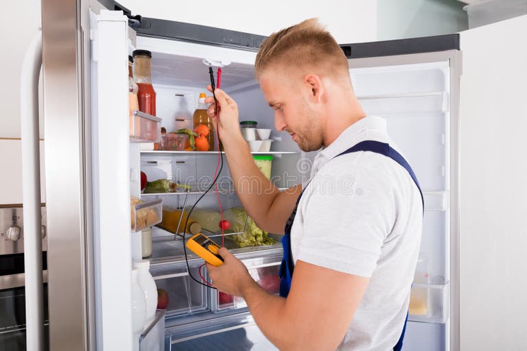 Repairman Checking Refrigerator Stock Image - Image of electrical ...
