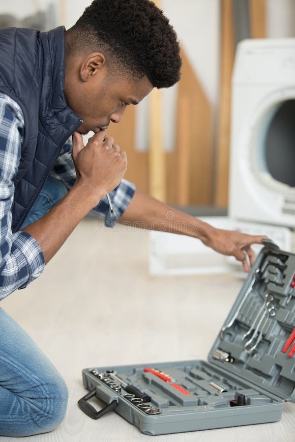 Repairman Choosing Correct Tool from Toolkit Stock Photo - Image of ...