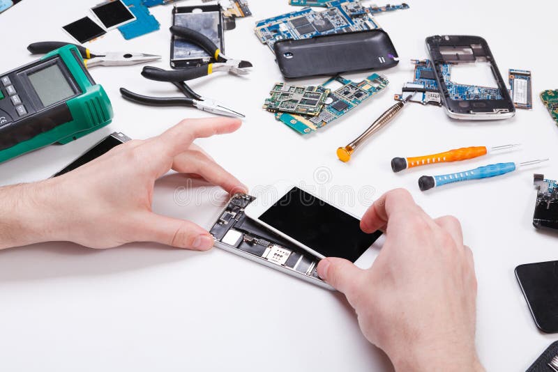 The Abstract Image of the Technician Assembling Inside of Smartphone by ...