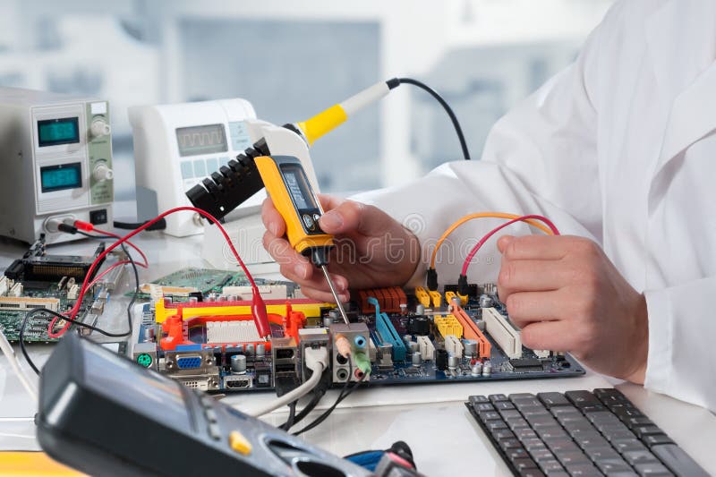 Electronic Equipment Repairing in Service Centre Stock Photo - Image of ...