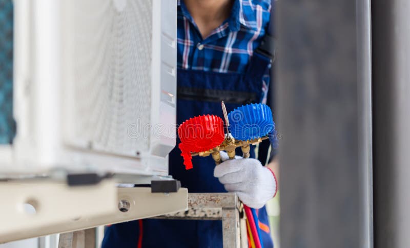 Repairman Fixing Air Conditioner Unit, Technician Man Installing Air ... Repairman Fixing Air Conditioner Unit, Technician Man Installing Air ...