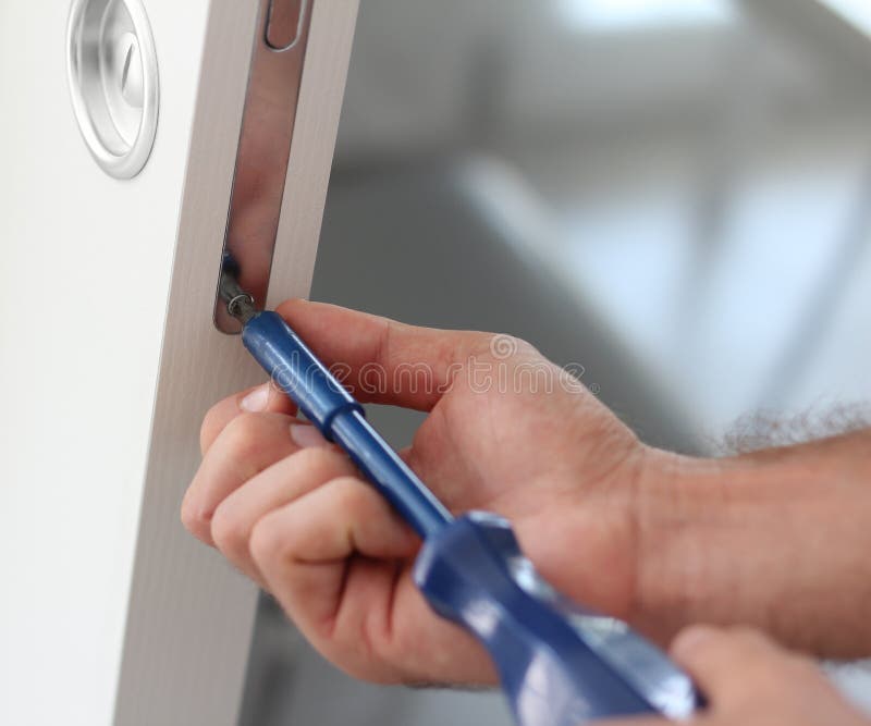Repairman Fixing a Door Lock Stock Image - Image of renovation ...