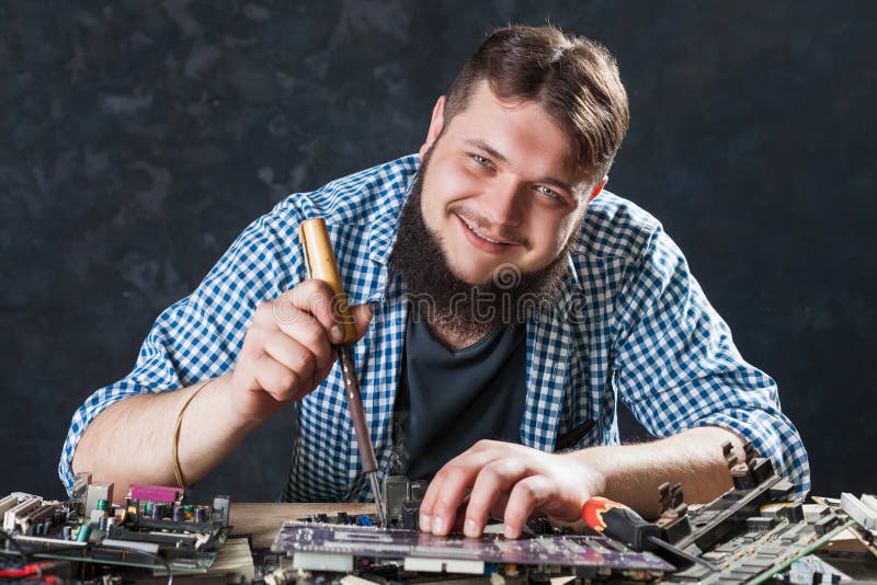 Repairman Fixing Problem with Soldering Tool Stock Photo - Image of ...