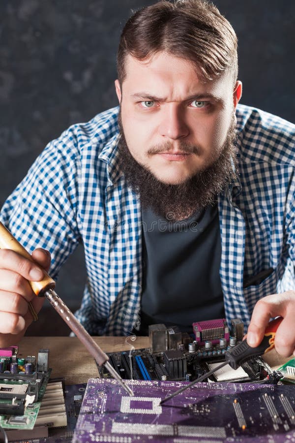 Repairman Fixing Problem with Soldering Tool Stock Image - Image of ...