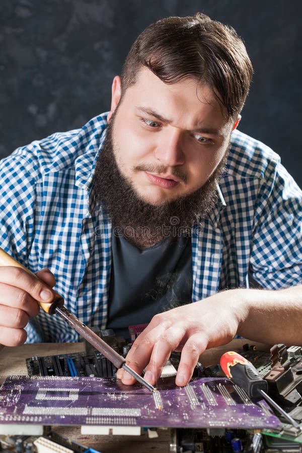 Repairman Fixing Problem with Soldering Tool Stock Image - Image of ...