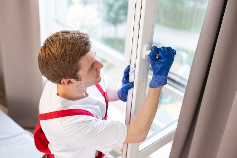A Repairman Fixing Windows in New Apartment Stock Image - Image of ...