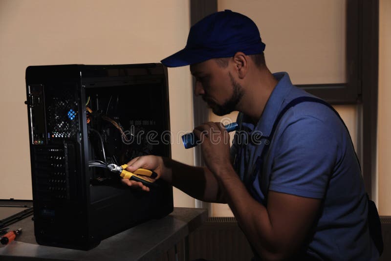 Repairman with Flashlight Fixing System Unit Stock Photo - Image of ...