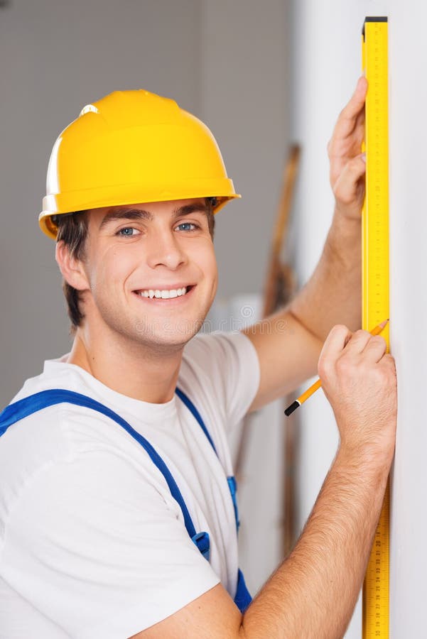Repairman Measuring with Builder Level Stock Photo - Image of idea ...