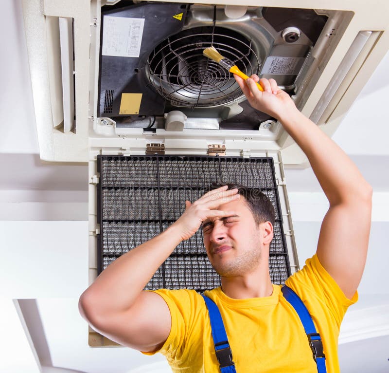 Repairman Repairing Ceiling Air Conditioning Unit Stock Photo - Image ...