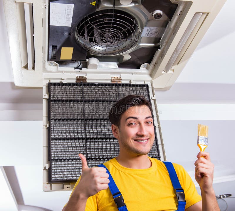 Repairman Repairing Ceiling Air Conditioning Unit Stock Image - Image ...