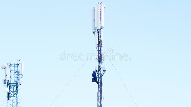 Repairman Repairing a Cell Tower. an Electrical Engineer on a Mobile ...